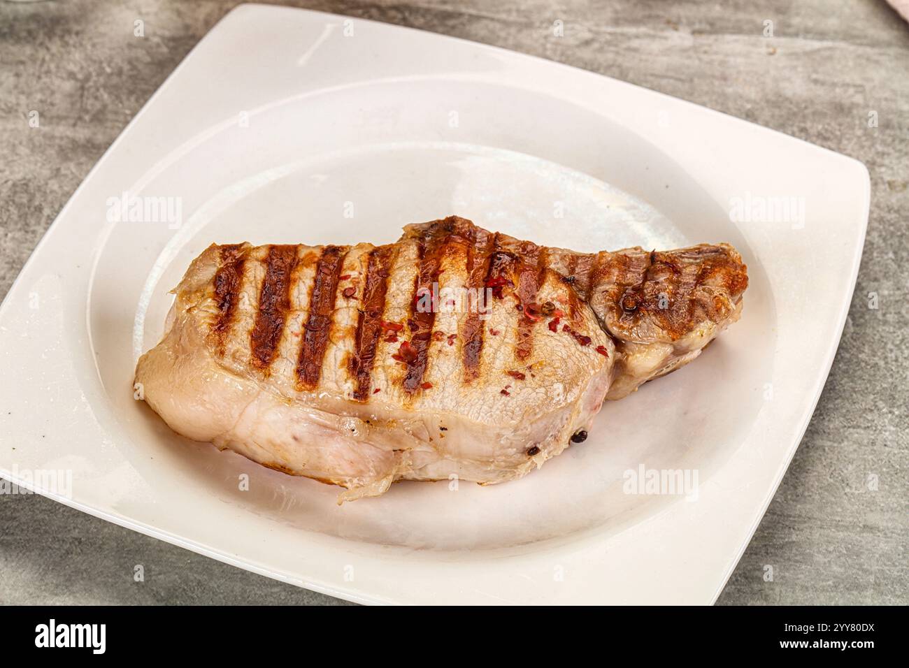 Grilled fat pork loin steak with bone Stock Photo - Alamy