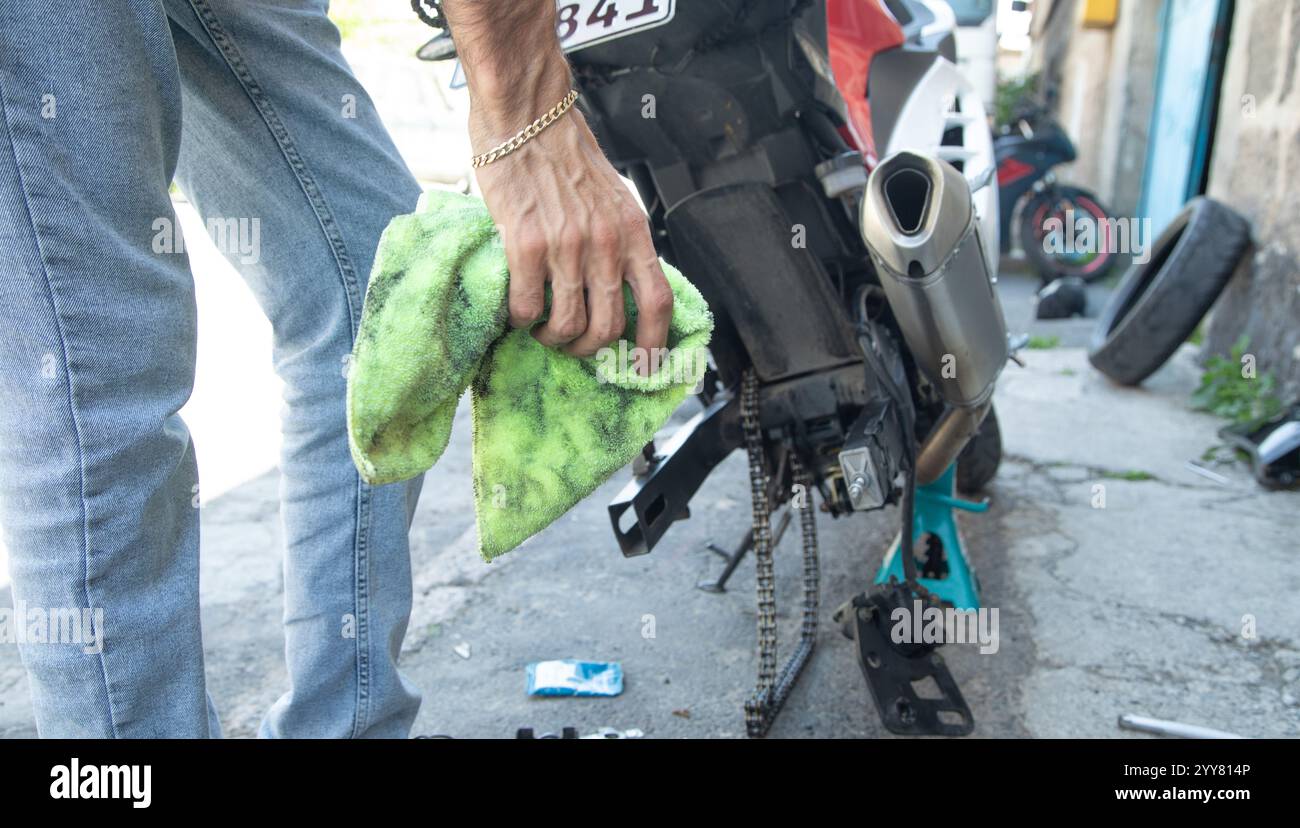 Motorcycle wash man cleaning hi-res stock photography and images - Alamy