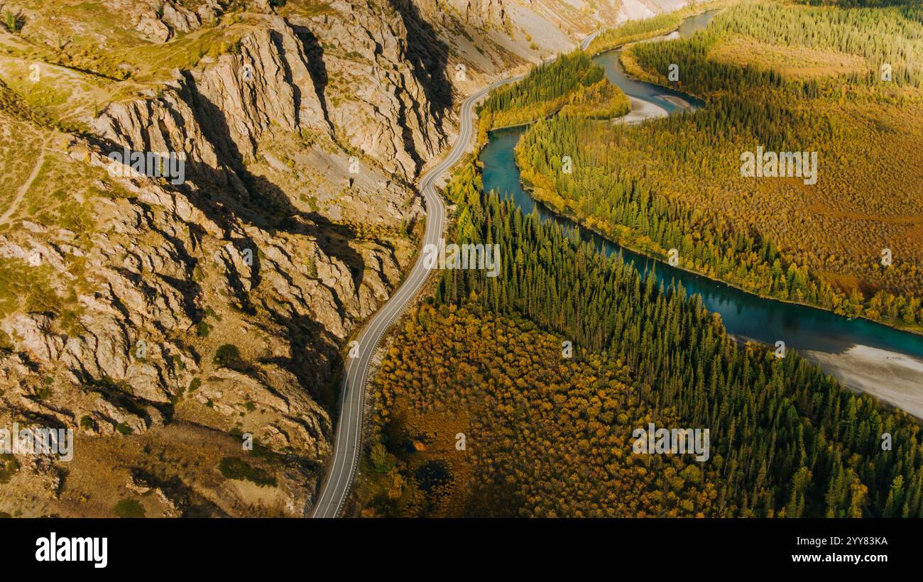Aerial view of a scenic highway winding through a colorful valley with ...