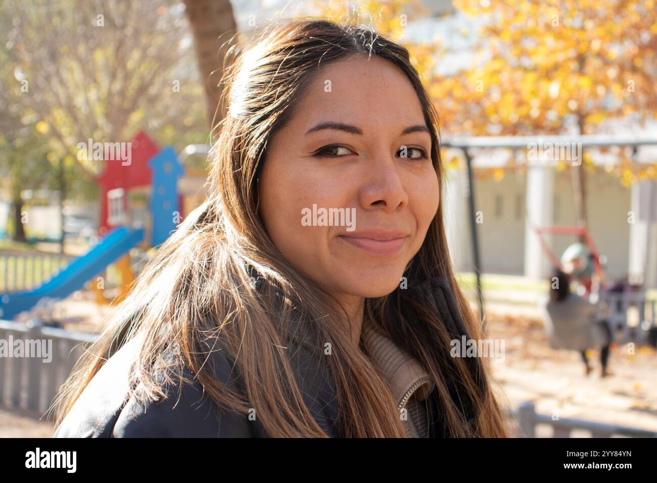 pretty young Peruvian woman smiling in close-up to camera while ...