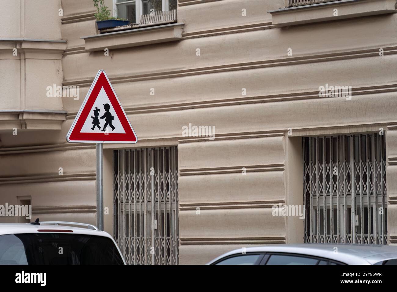 Caution sign for school zone in urban area Stock Photo - Alamy