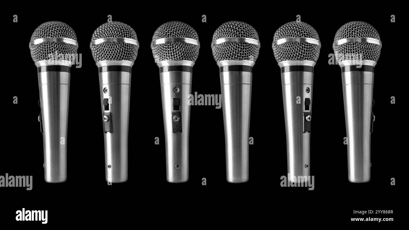 Various views of silver metallic professional microphone with power ...