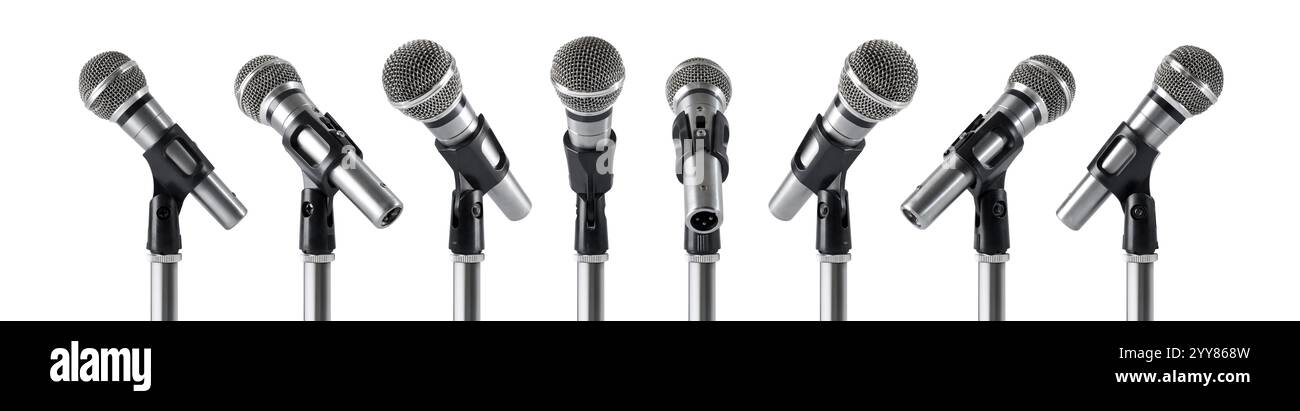 Various views of silver metallic professional microphone with stand and ...