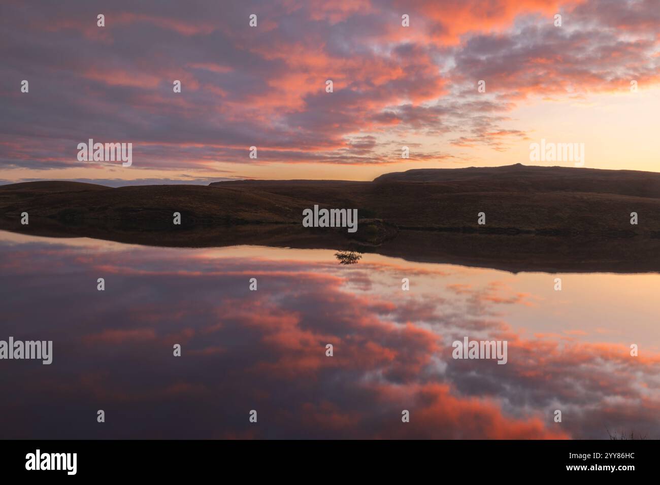 Quiraing mountains Reflections at a lake in Skye Island, Scotland Stock ...