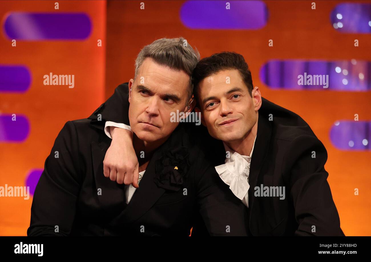 EDITORIAL USE ONLY Robbie Williams and Rami Malek during filming for ...