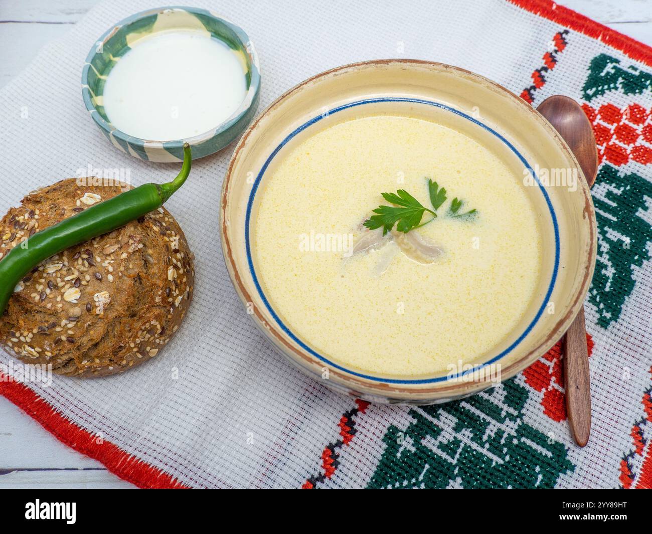 traditional romanian tripe soup known as ciorba de burta served with ...