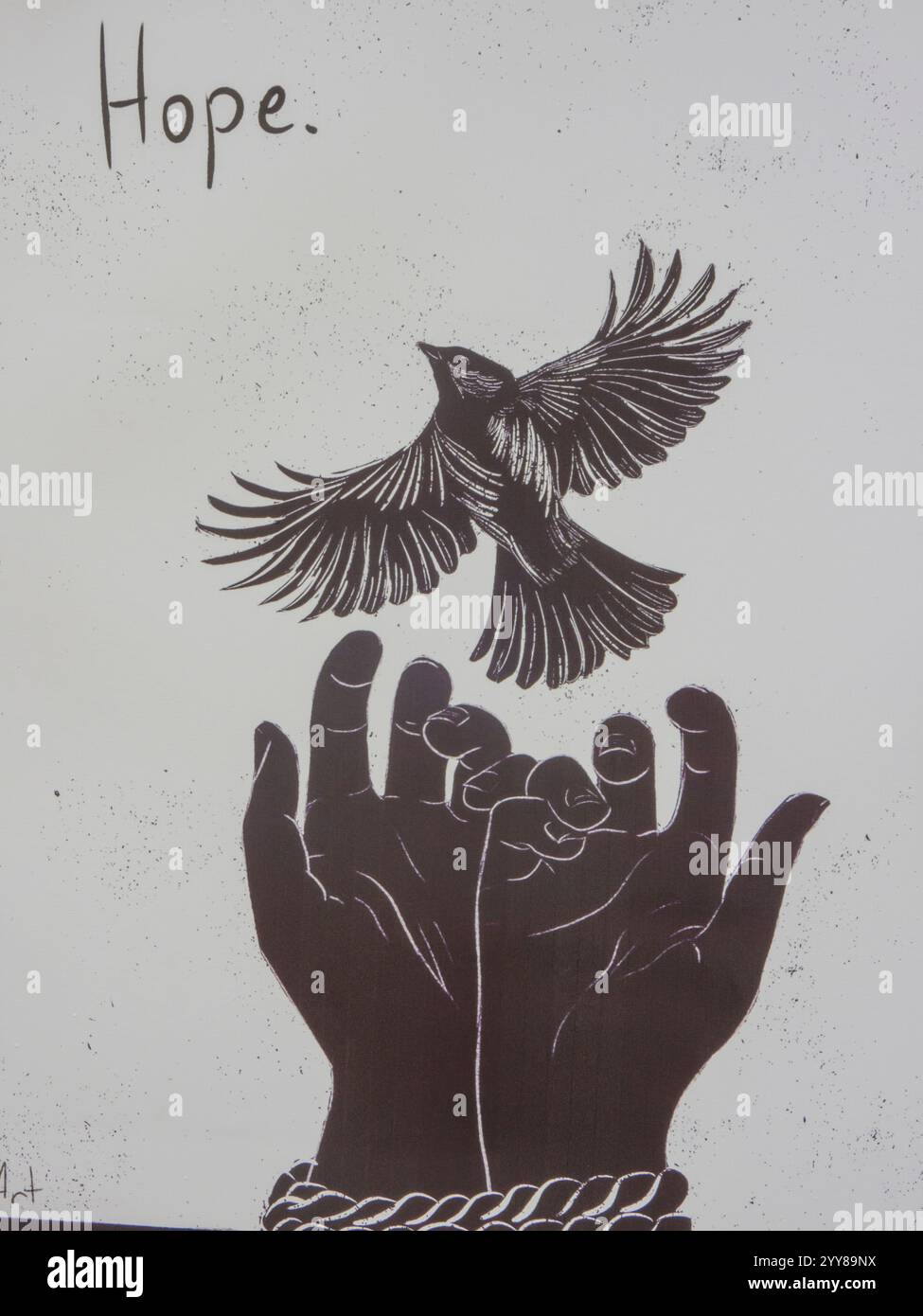 Hope - conceptual graffiti showing hands releasing a bird Stock Photo ...