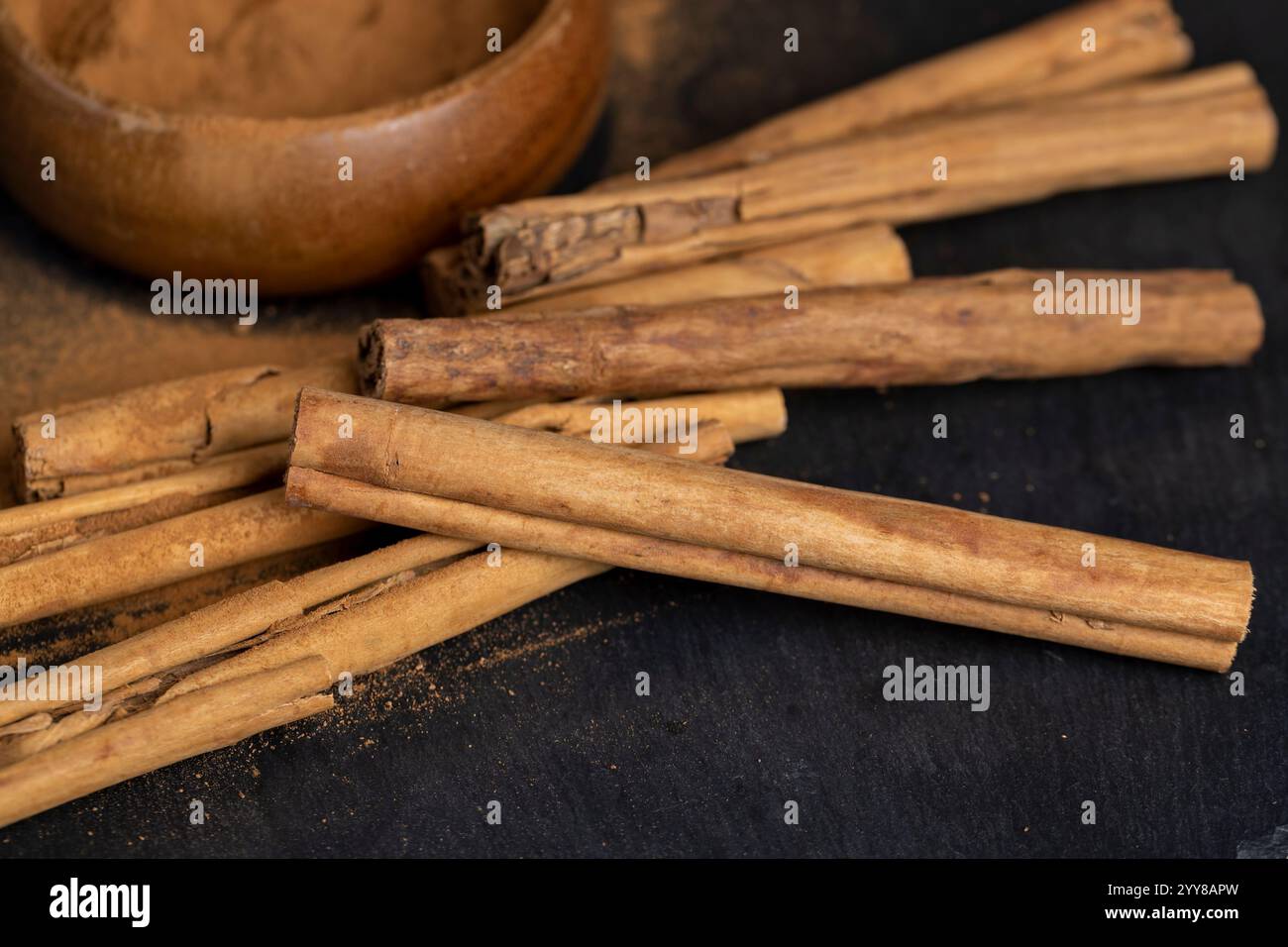 cinnamon bark with powder, ground and whole cinnamon used for making ...