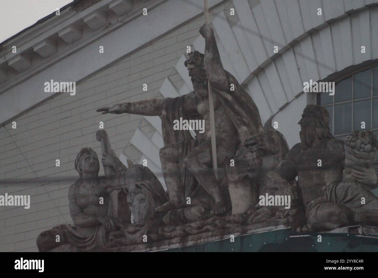 A statue of a man pointing to the sky Stock Photo - Alamy