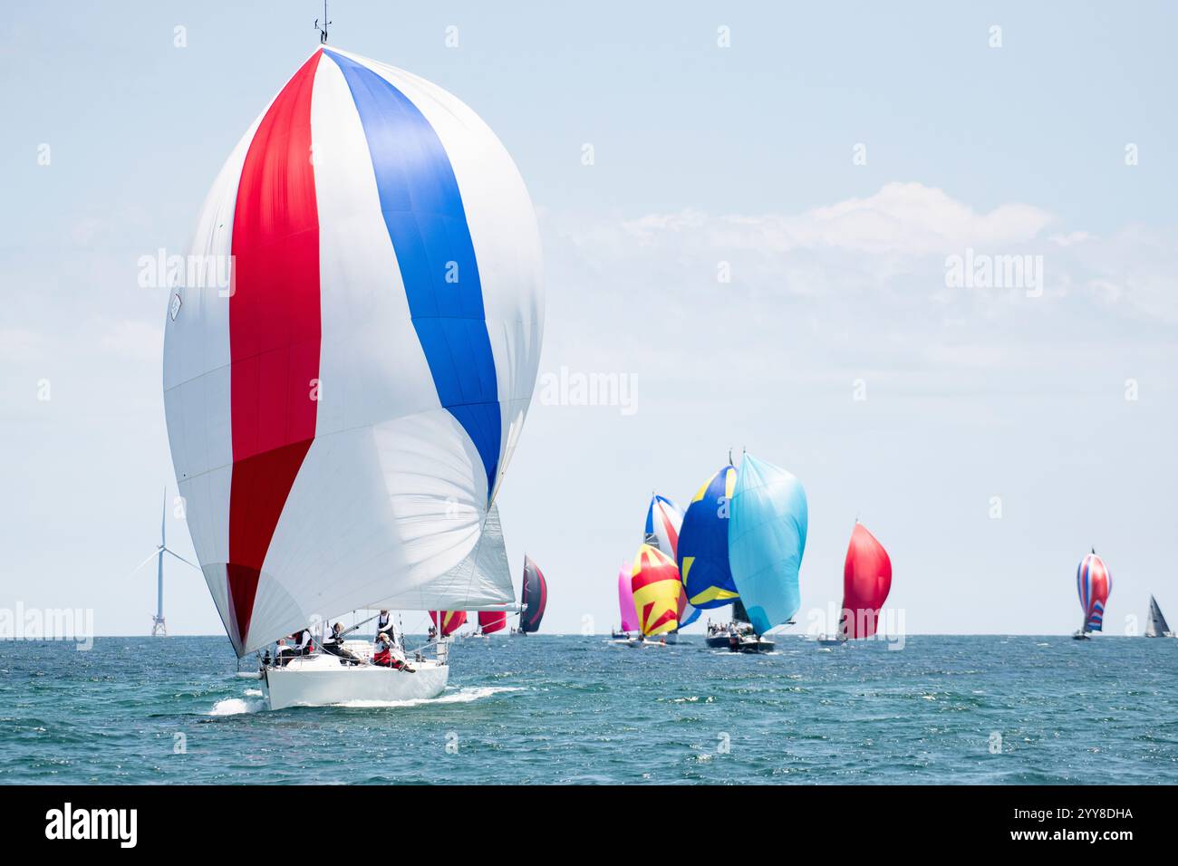 Boats sailing by Wind Turbines in New England Stock Photo - Alamy