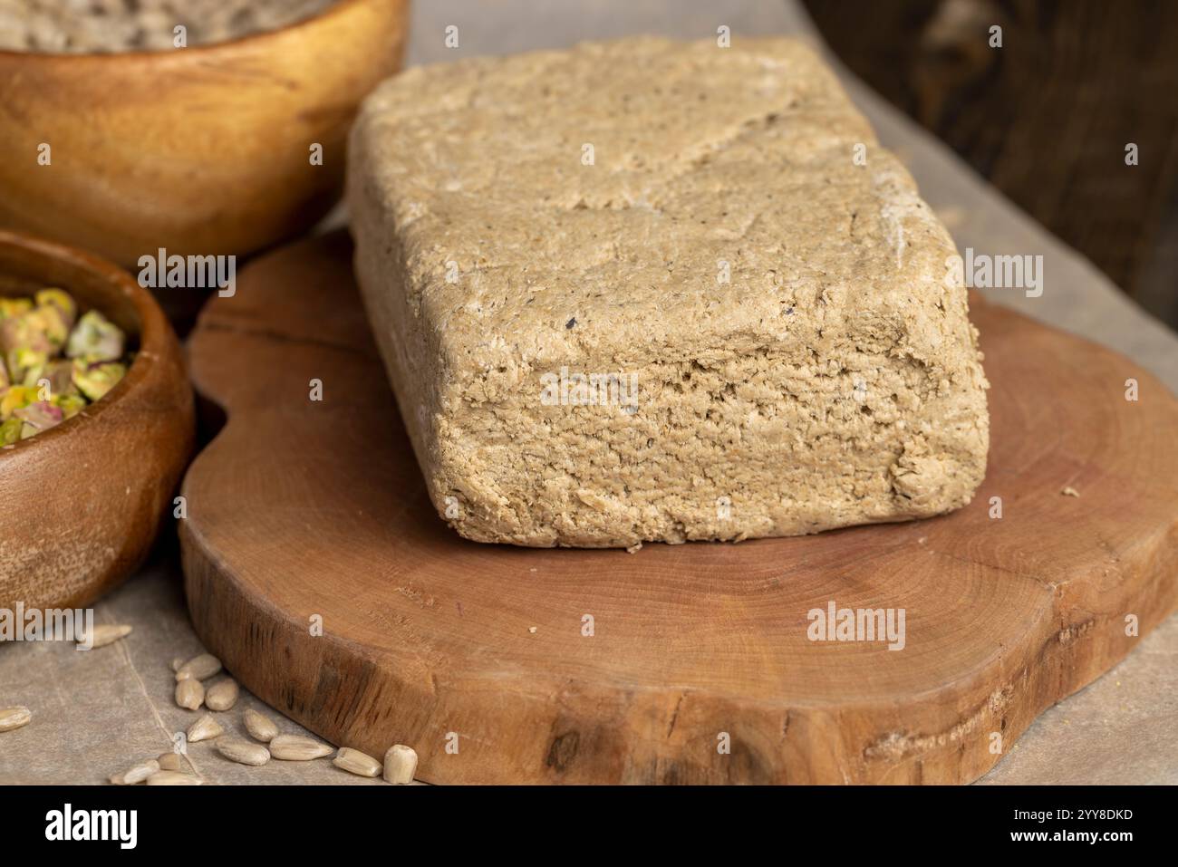 halva from sunflower seeds closeup, a sweet delicious dessert made from fried sunflower seeds ...