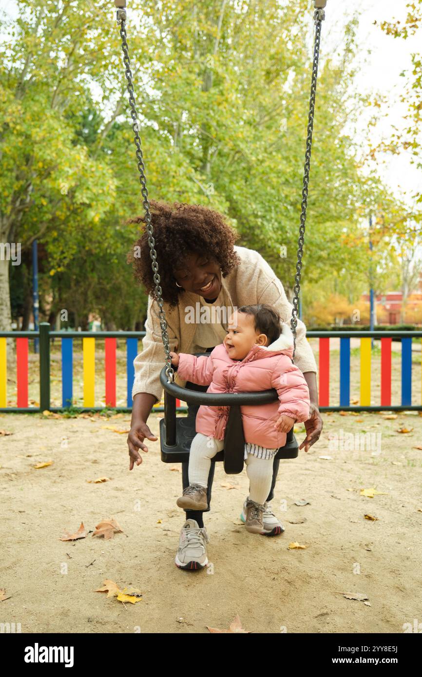 Mother daughter on playground in hi-res stock photography and images - Alamy