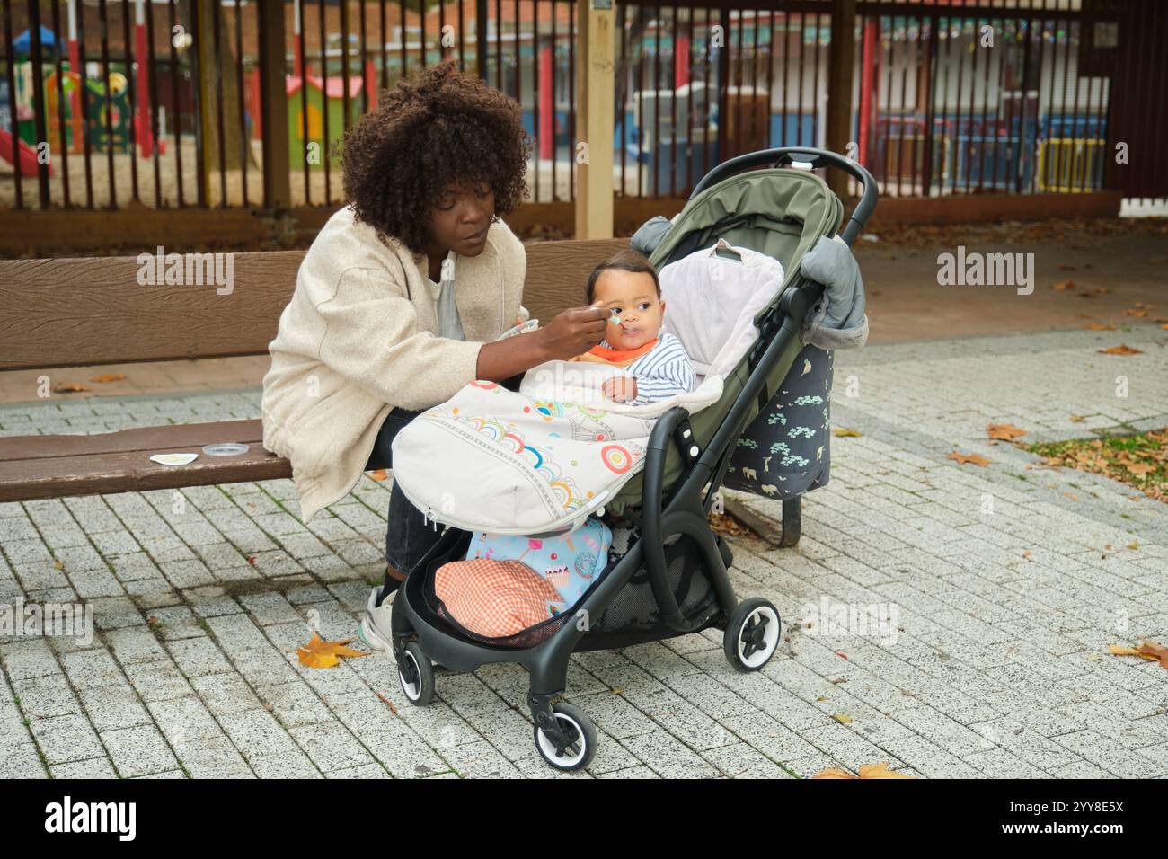 Baby in stroller family hi-res stock photography and images - Alamy