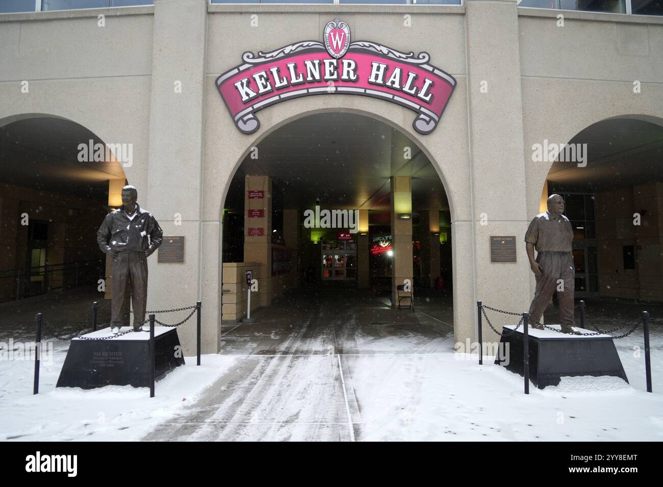 Statues of former Wisconsin Badgers athletic director Pat Richter (left ...