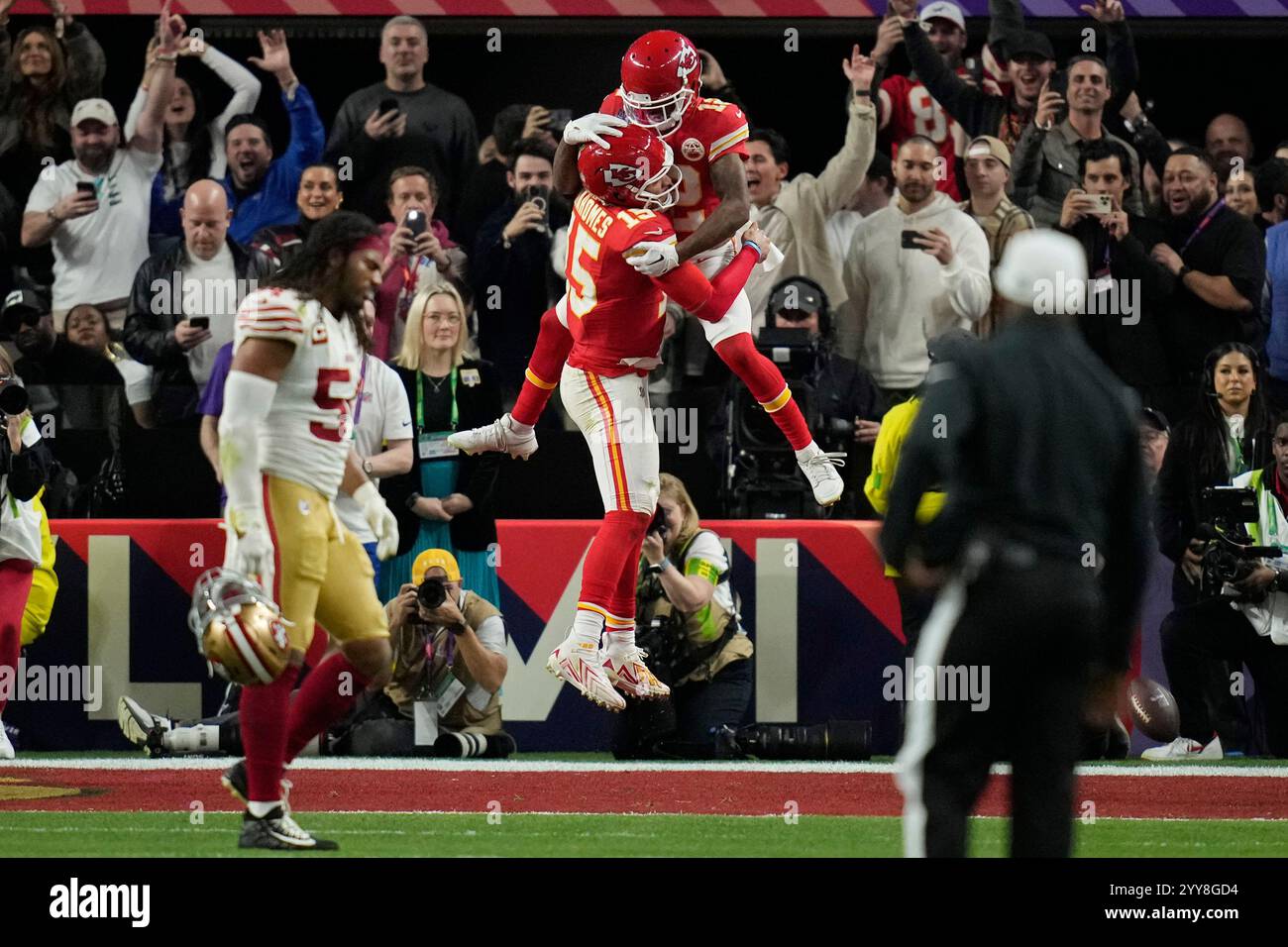 FILE - Kansas City Chiefs quarterback Patrick Mahomes celebrates with ...
