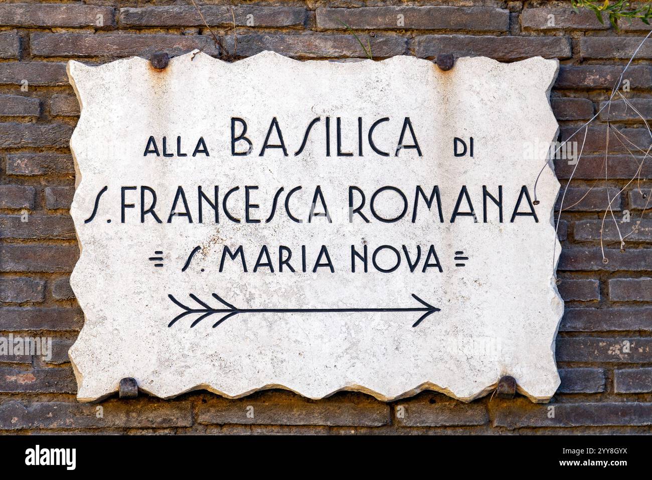 Directional sign to the Basilica di Santa Francesca Romana (Santa Maria ...