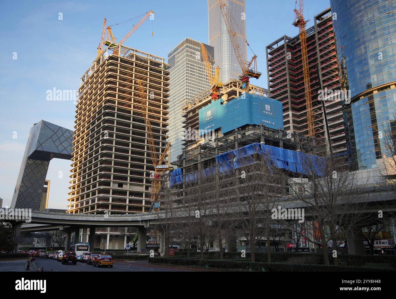 A photo shows building under construction at central Beijing in Beijing ...