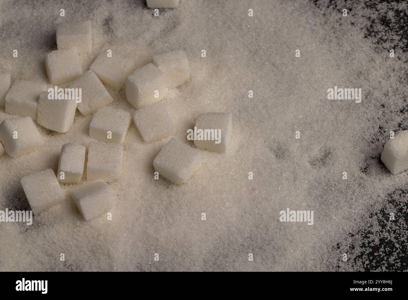 cubes of refined sugar , white sugar and sugar beet close up Stock ...