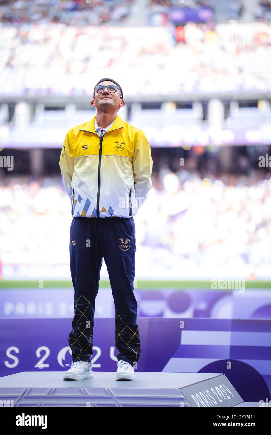 Daniel Pintado at the award ceremony and collecting her medal at the ...