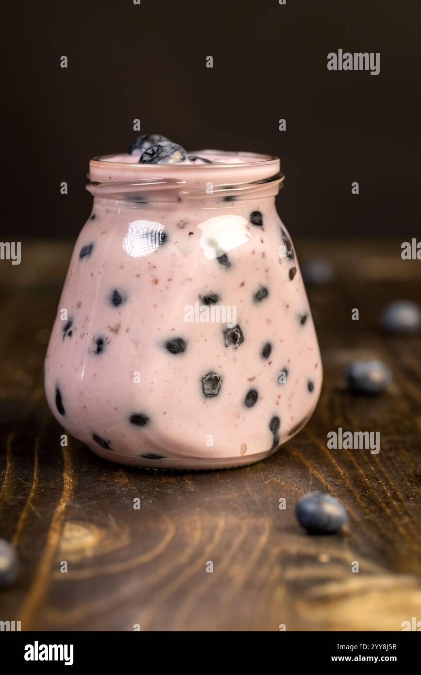 blueberry and berry-flavored yogurt, blueberry yogurt with slices and ...