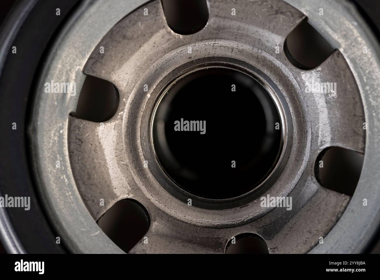 details of a replaceable metal filter for cleaning engine oil in a car ...