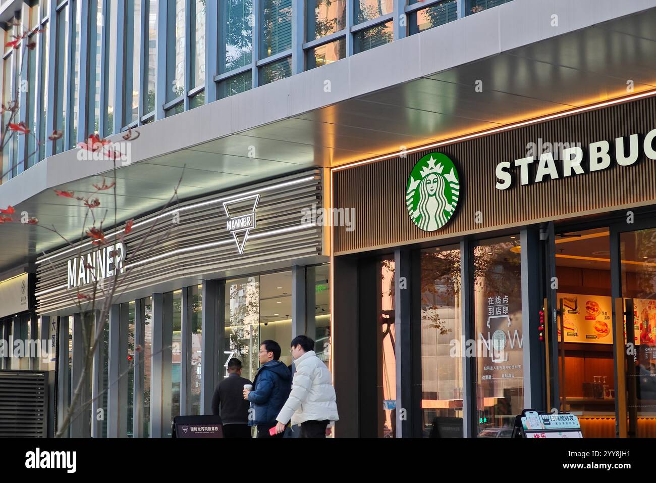 SHANGHAI, CHINA - DECEMBER 20, 2024 - A Starbucks and Manner coffee ...