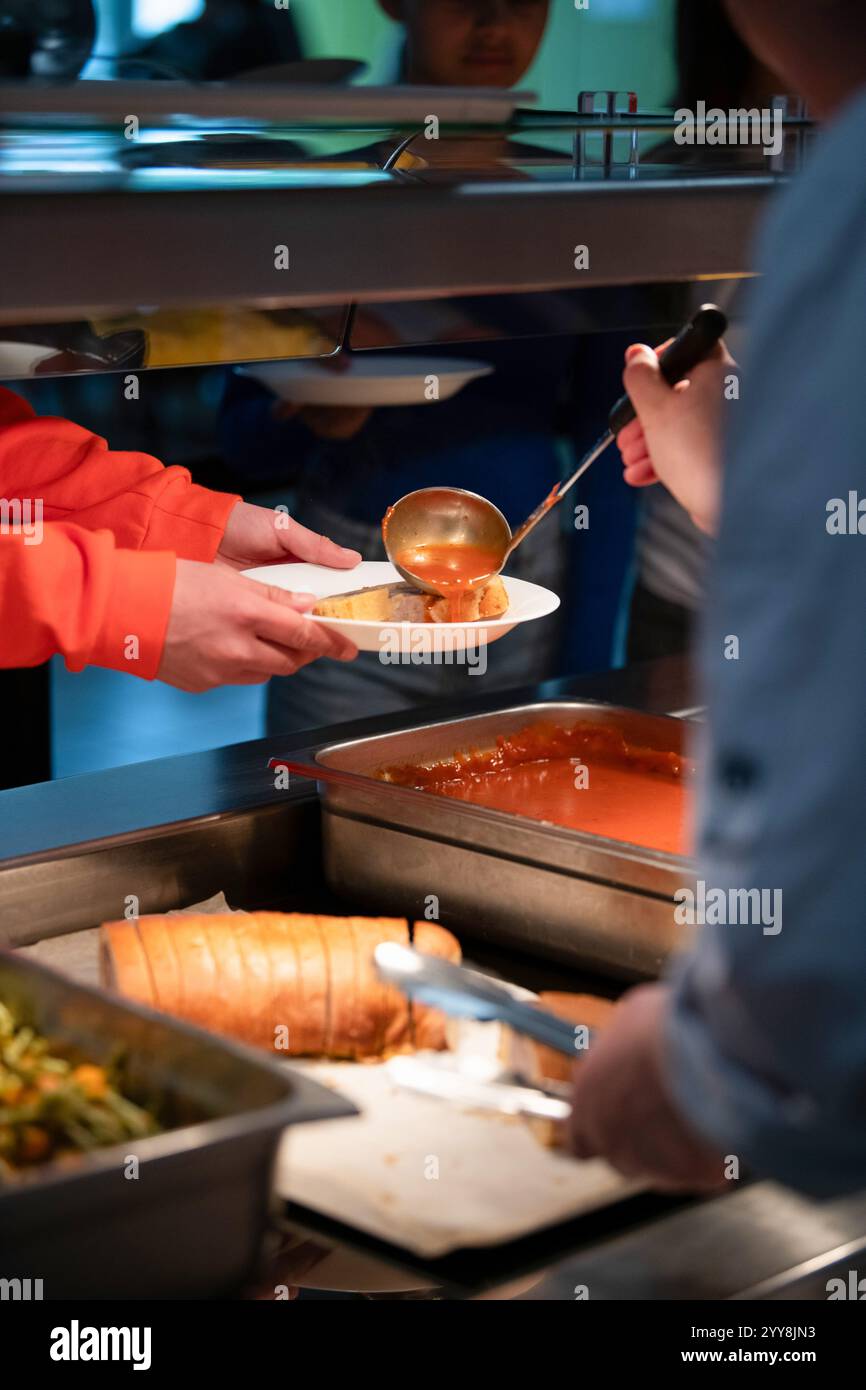 Institutional catering: the meal is served in a school cafeteria, a ...