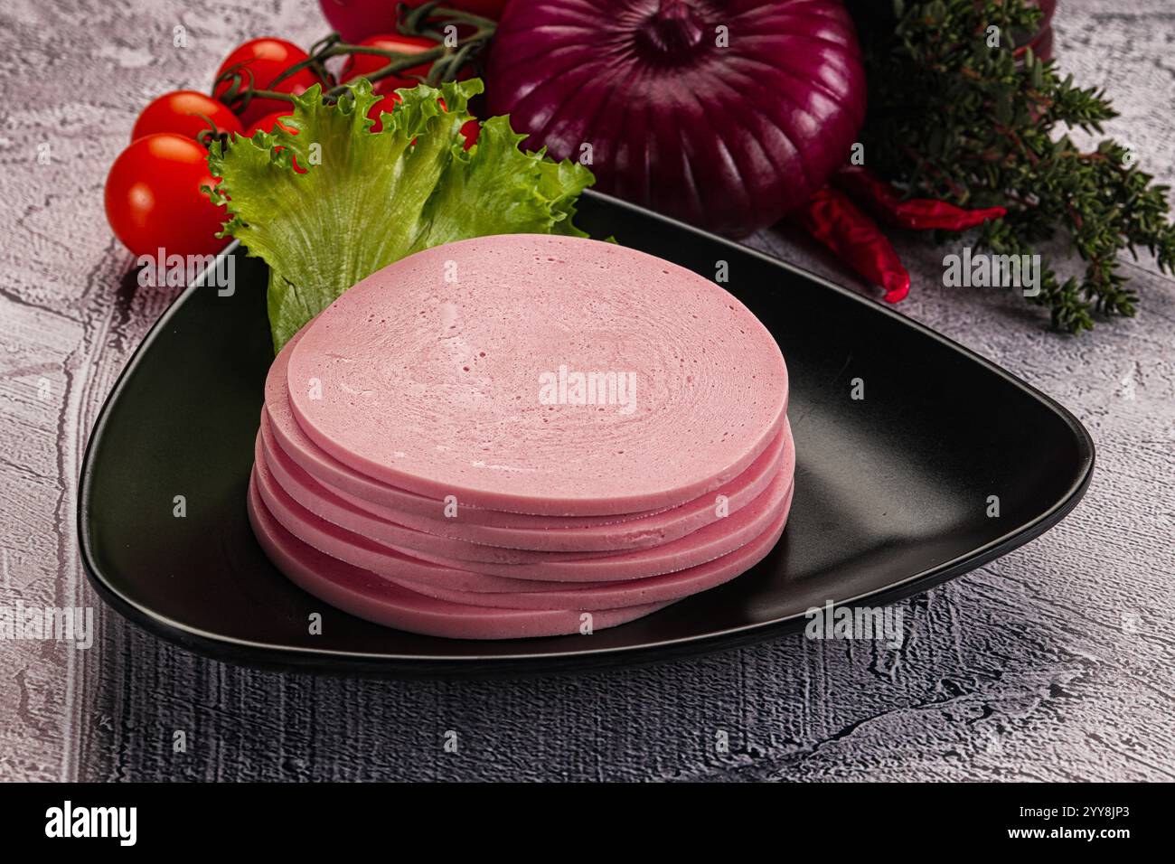 Boiled pork sliced sausage stack for breakfast Stock Photo - Alamy