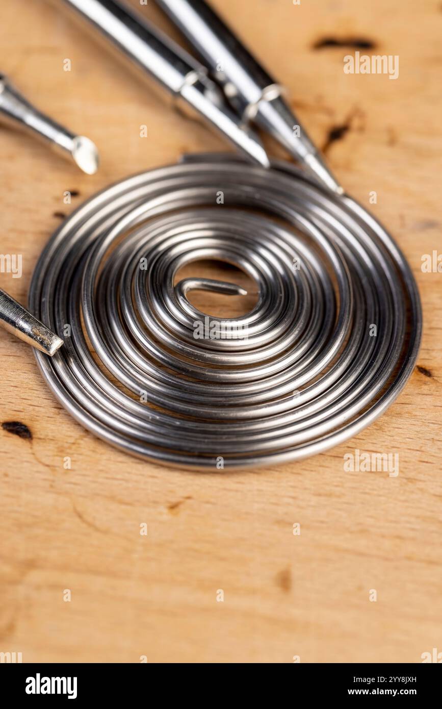 thin solder and soldering iron tips, twisted solder for repair work ...