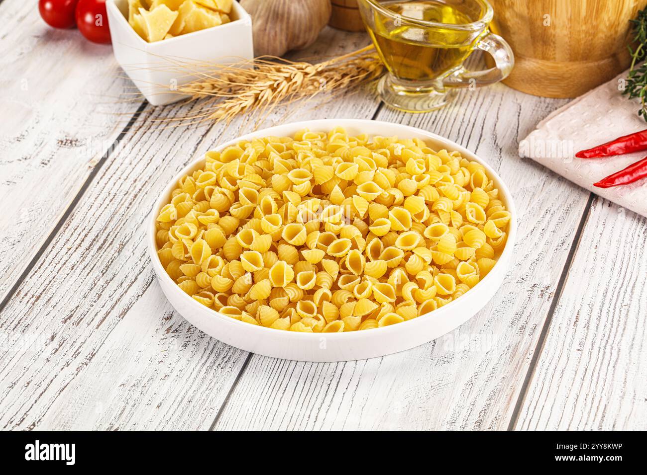 Italian cuisine - dry conchiglie shell pasta Stock Photo - Alamy