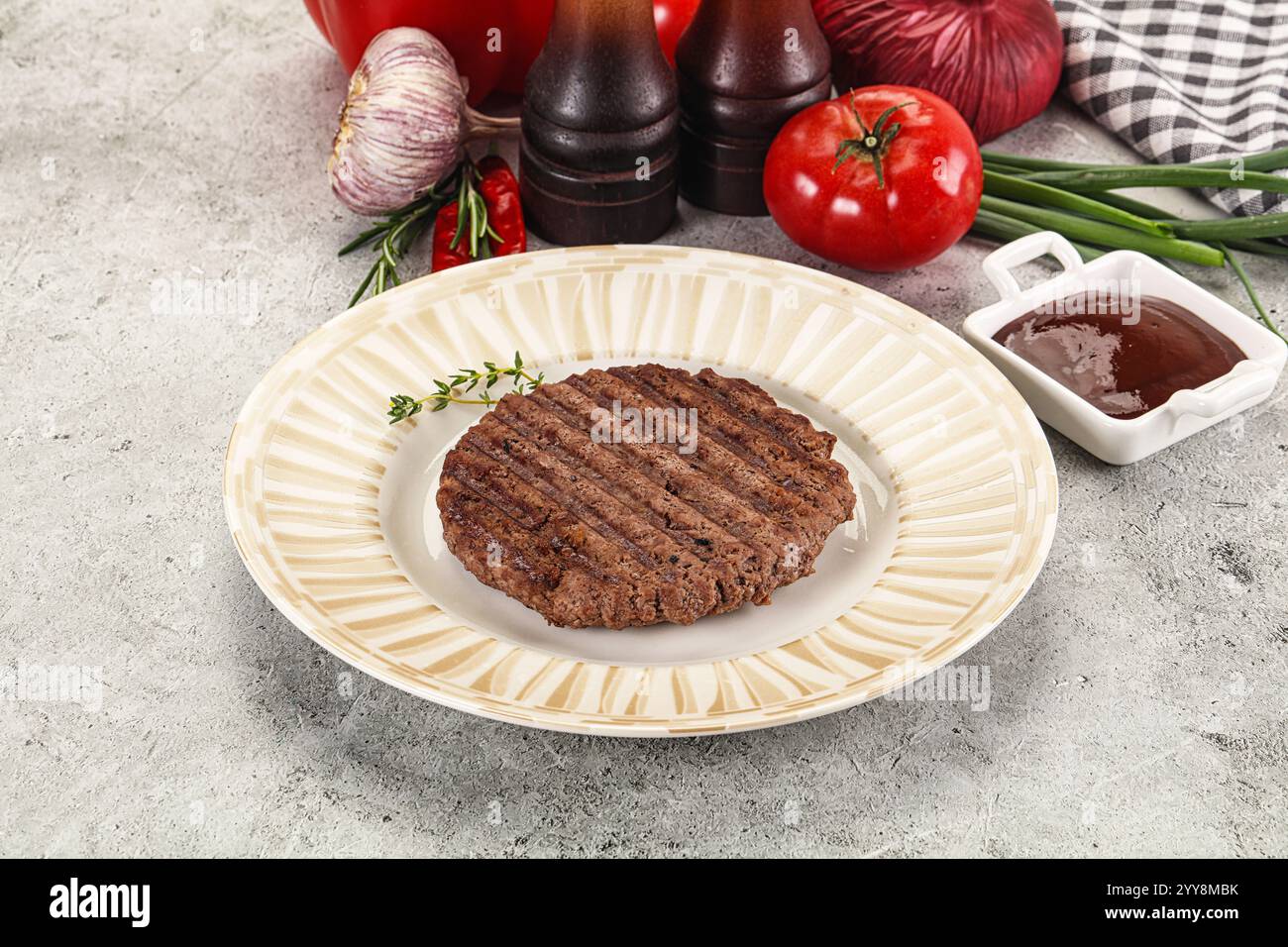 Grilled minced beef burger cutlet served thyme Stock Photo - Alamy