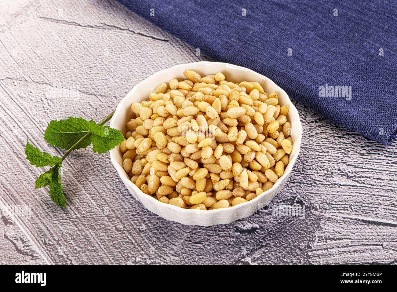 Delicous Peeled cedar nut in the bowl Stock Photo - Alamy