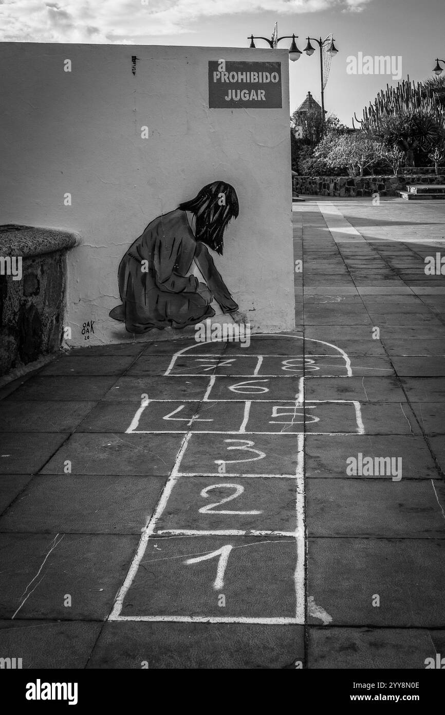 Playful spirit meets forbidden art. A hopscotch game defying rules on ...