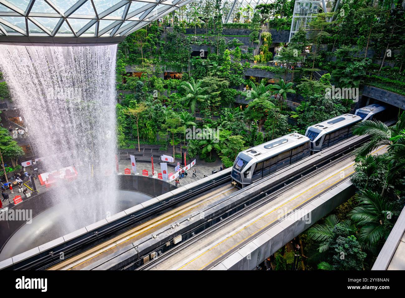 Singapore - July 4 2024: Changi airport monorail and vortex at Jewel ...