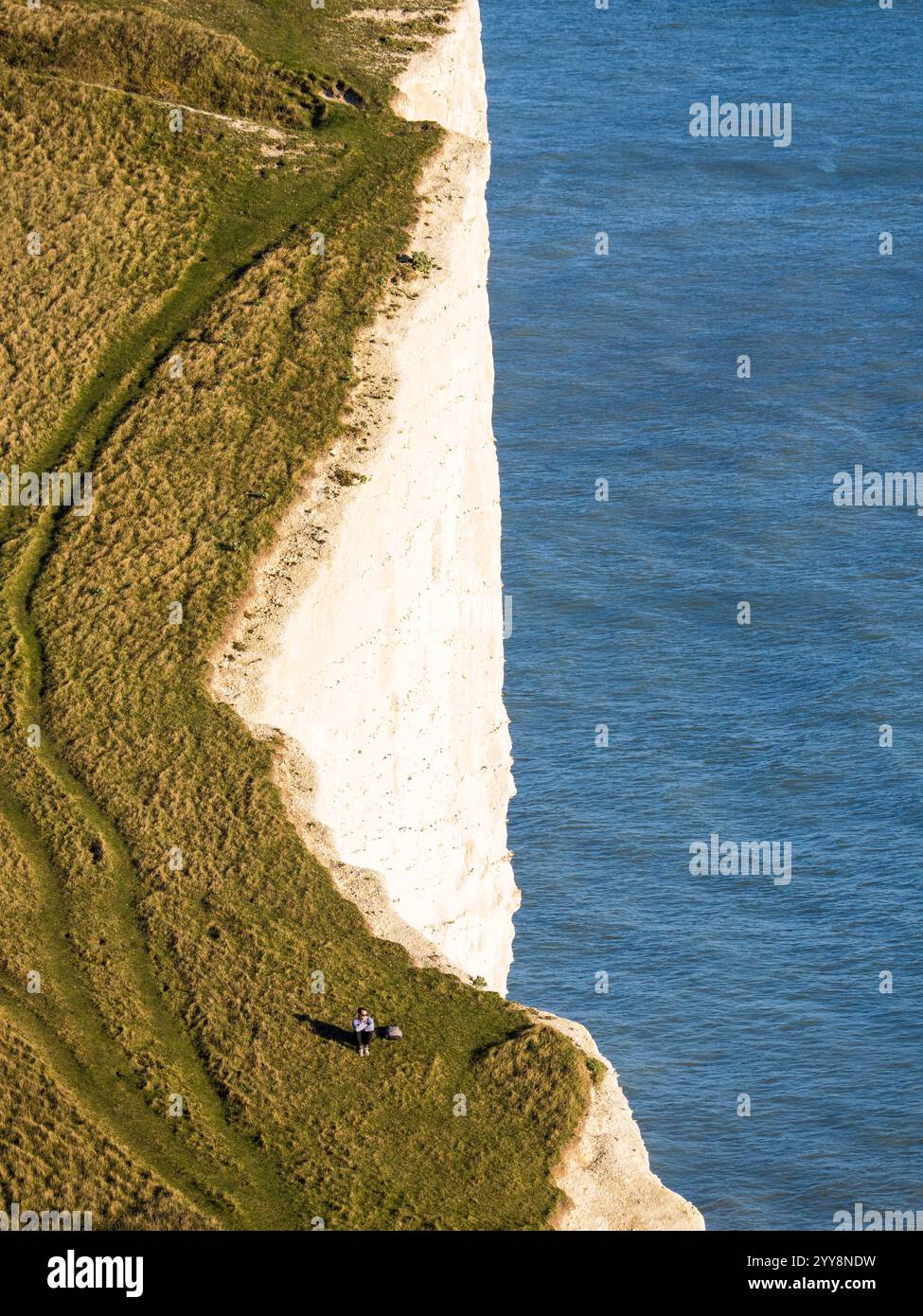Man Sitting nr Cliff Edge, White Cliffs of Dover, Dover, Kent, England ...