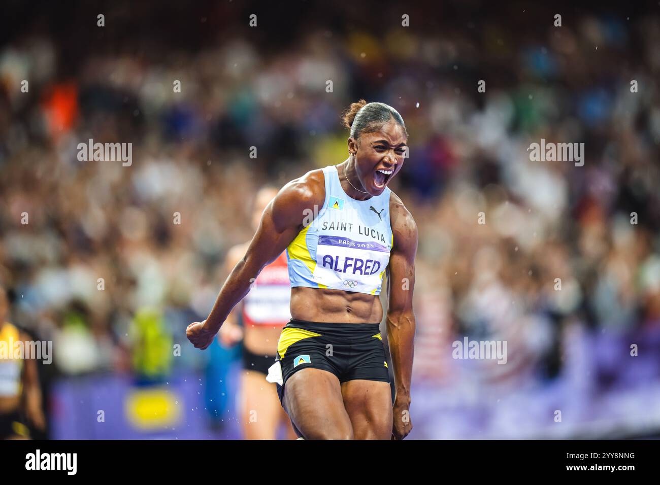 Julien Alfred winning in the 100 meters relay at the Paris 2024 Olympic ...