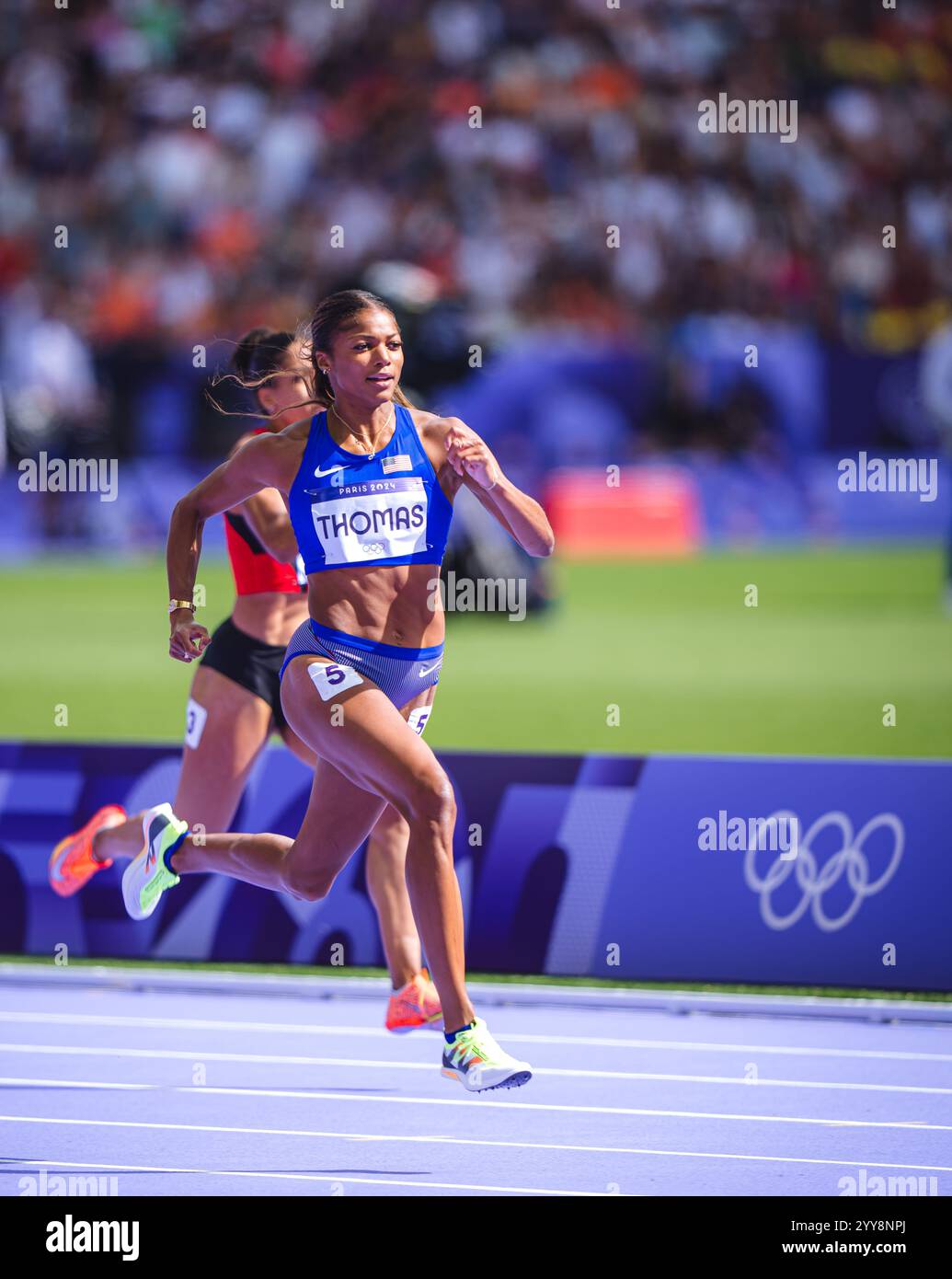 Gabrielle Thomas participating in the 200 meters at the Paris 2024 ...