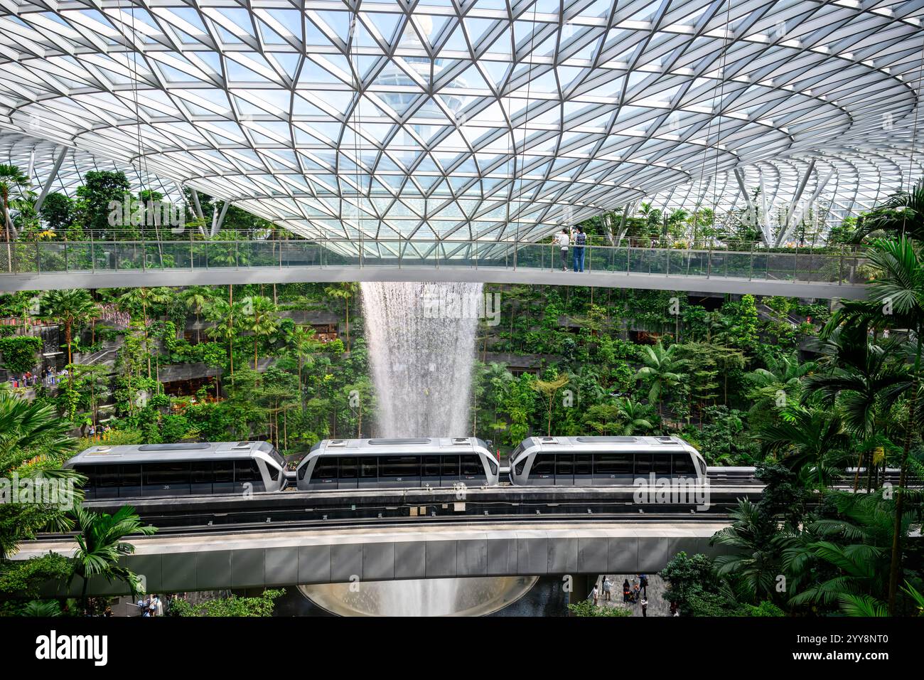 Singapore - July 4 2024: Changi airport monorail and vortex at Jewel ...