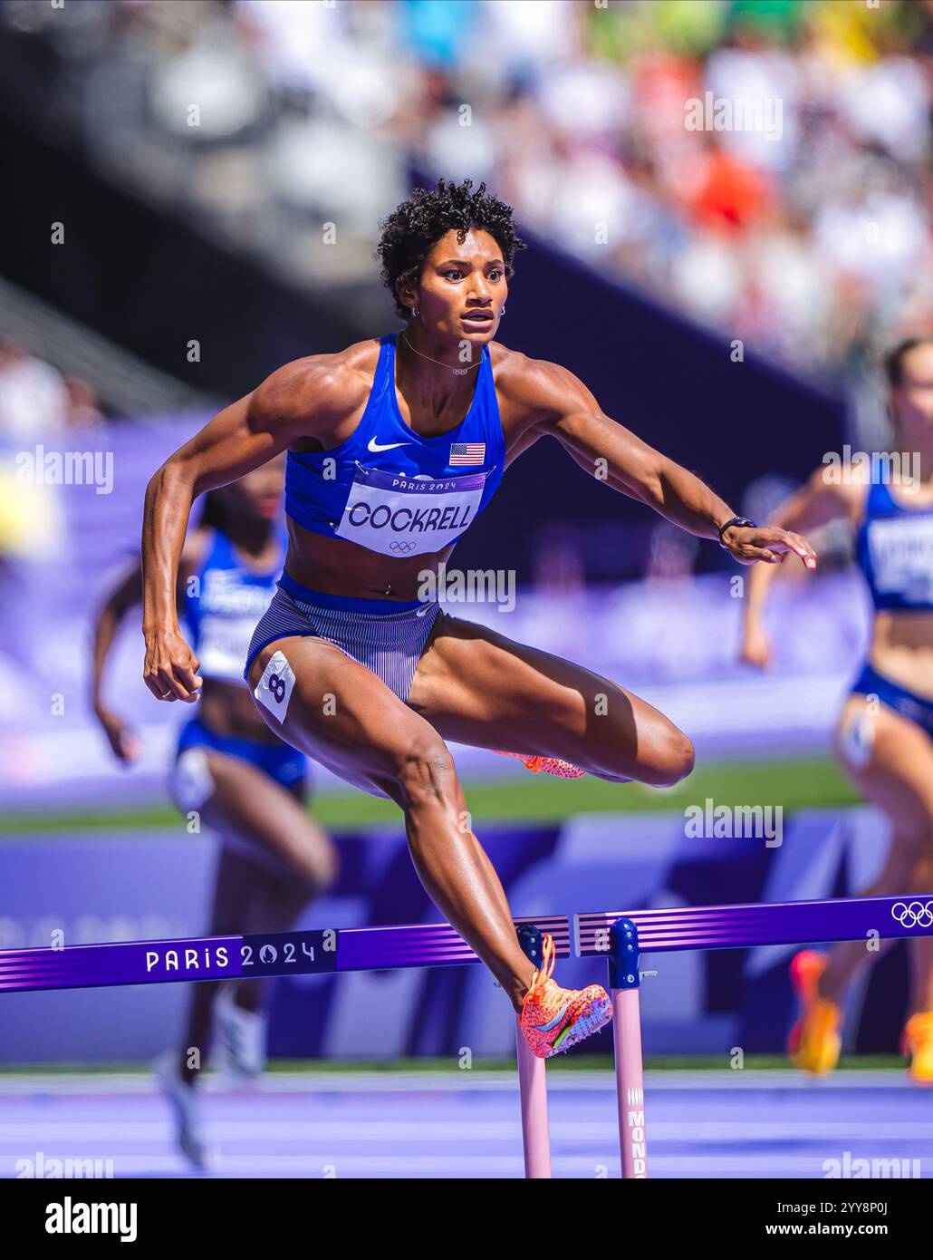 Anna Cockrell participating in the 400 meters hurdles at the Paris 2024 ...