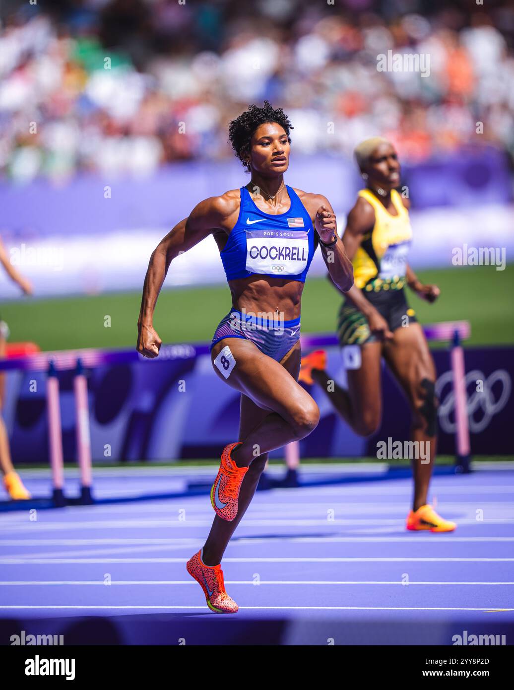 Anna Cockrell participating in the 400 meters hurdles at the Paris 2024 ...