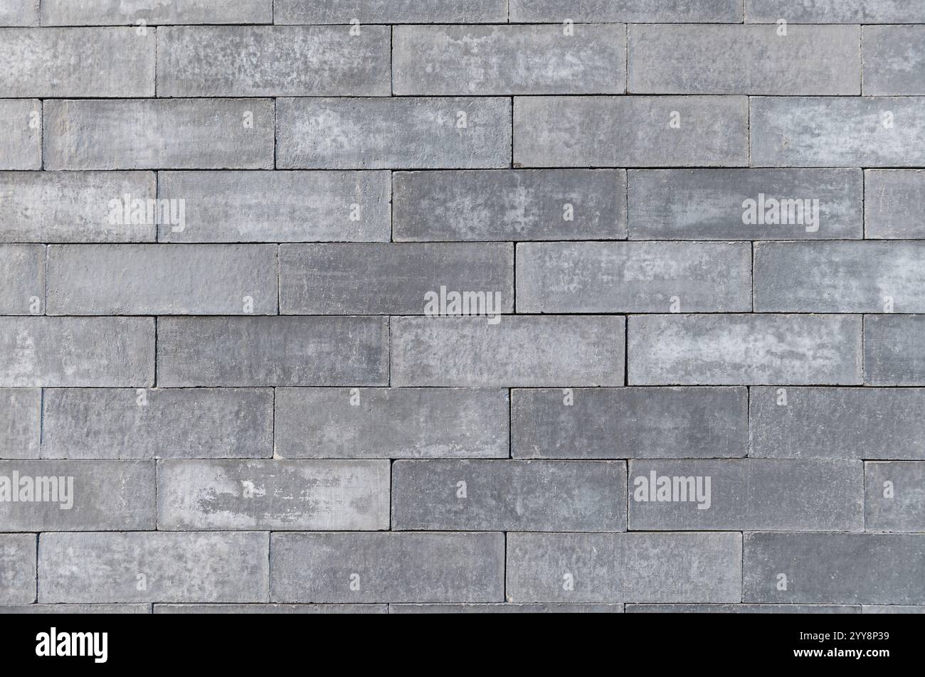 Grey brick wall texture background Stock Photo - Alamy