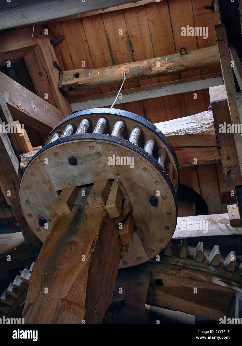 Close-up of the wooden gear and drive mechanism inside Windmill de ...