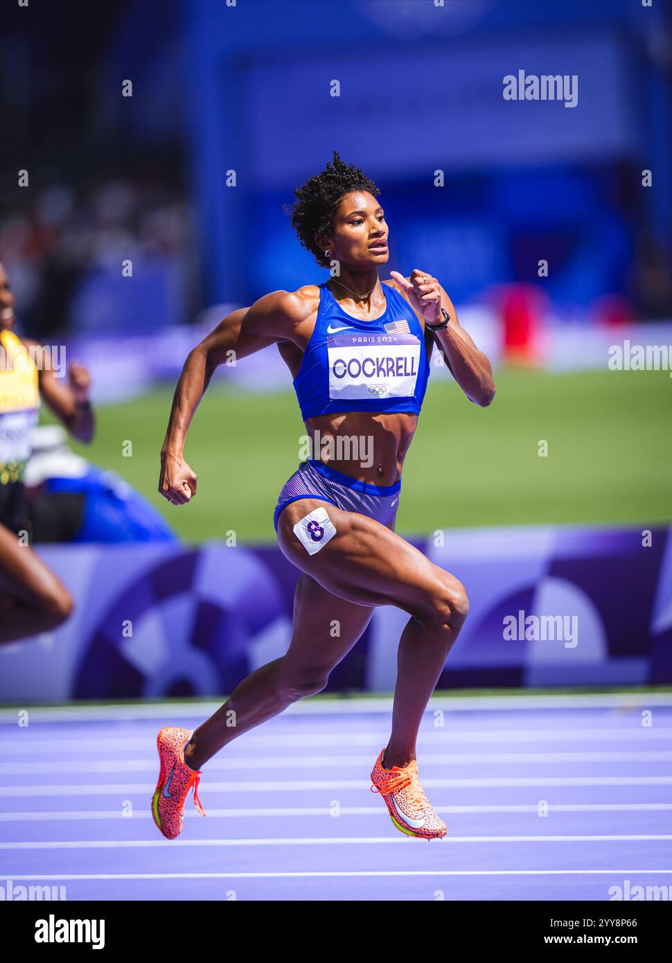 Anna Cockrell participating in the 400 meters hurdles at the Paris 2024 ...