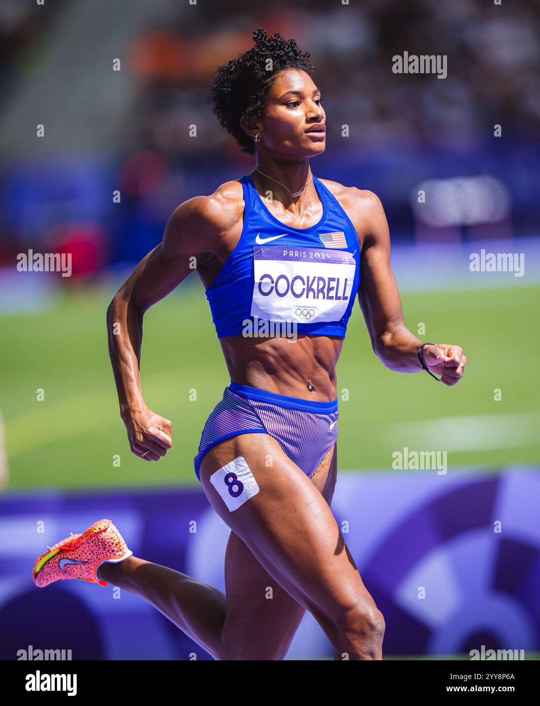 Anna Cockrell participating in the 400 meters hurdles at the Paris 2024 ...