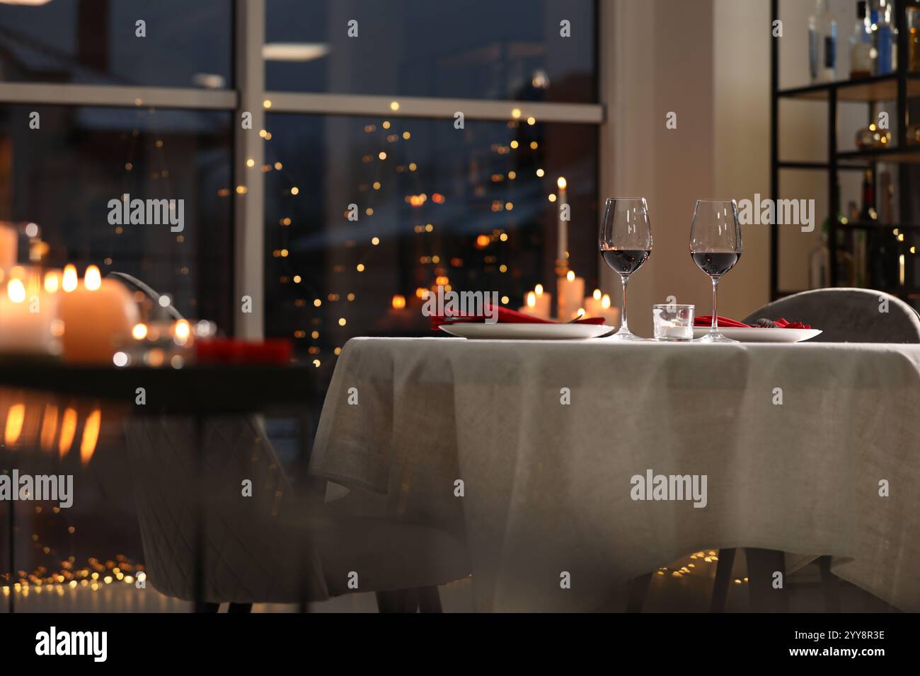 Table setting for romantic dinner in restaurant Stock Photo - Alamy