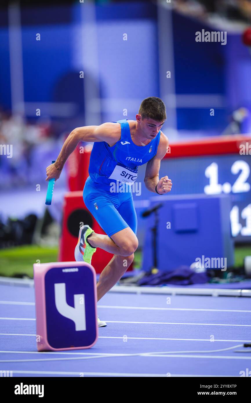 Luca Sito participating in the 4X400 meters relay at the Paris 2024 ...