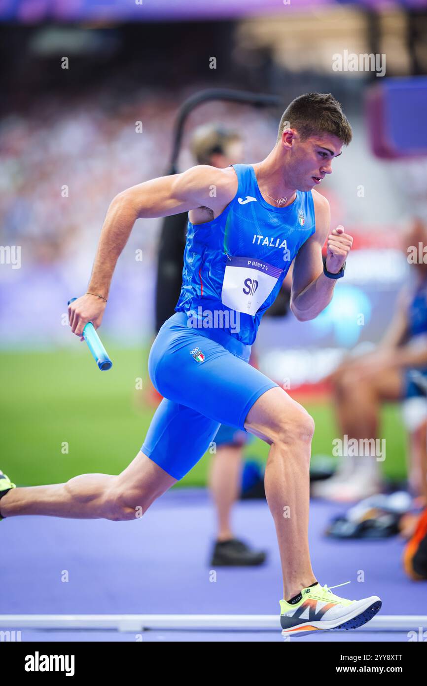 Luca Sito participating in the 4X400 meters relay at the Paris 2024 ...