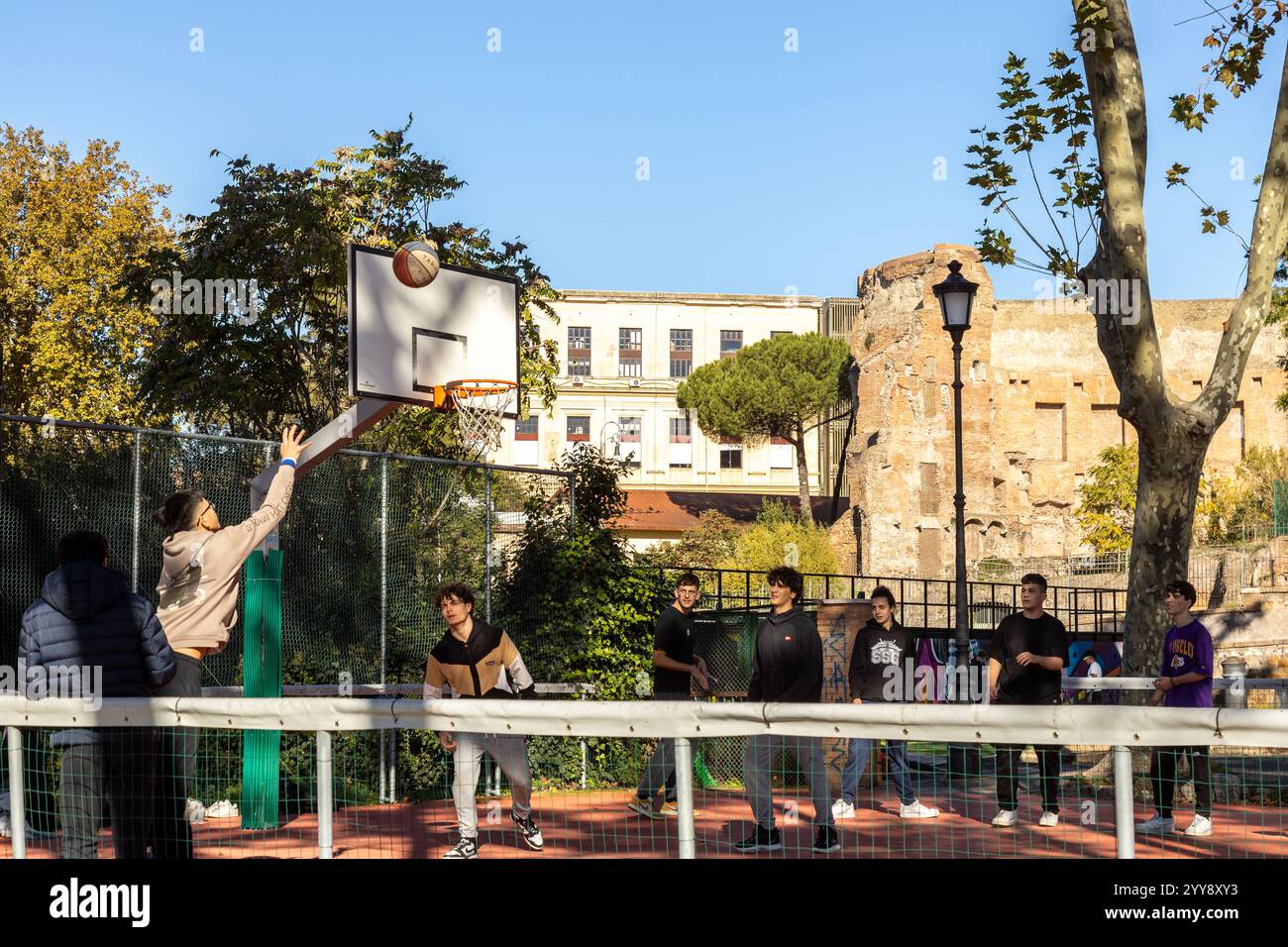 Rome, Italy - Nov 15th, 2024: Boys playing basketball on a court at ...
