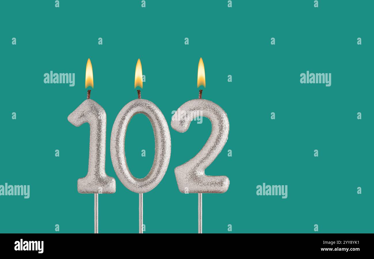 Birthday card on a green background - Candle in the shape of the number ...