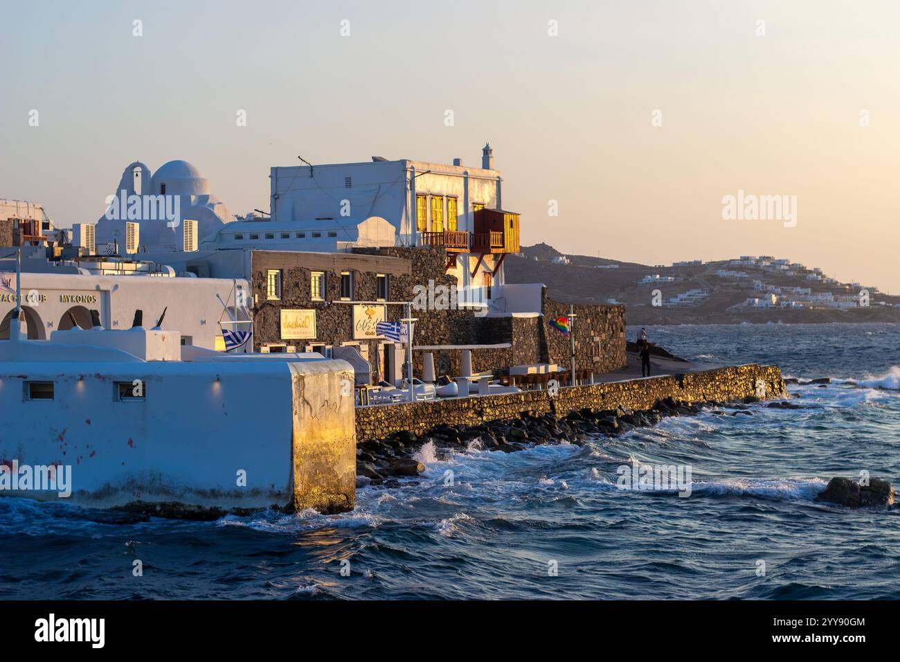 Waterfront architecture in Mykonos at sunset. Traditional Cycladic ...